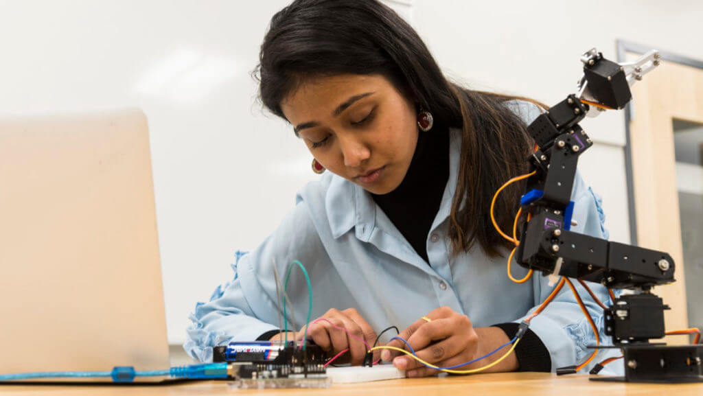 Electro-Mechanical student in lab - School of Advanced Technology